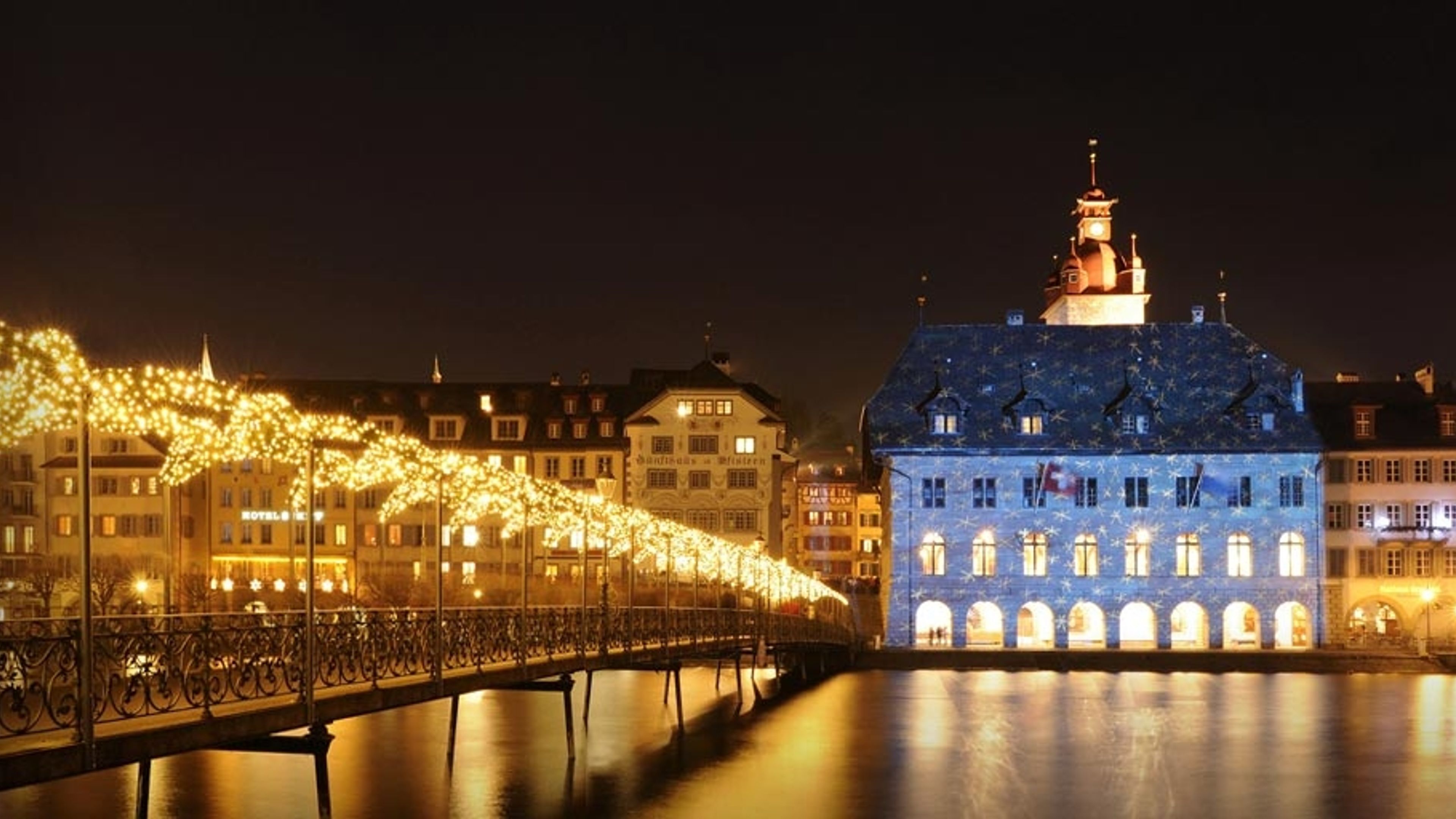 Lucerne Town Hall illuminated with Christmas lights by artist Gerry ...