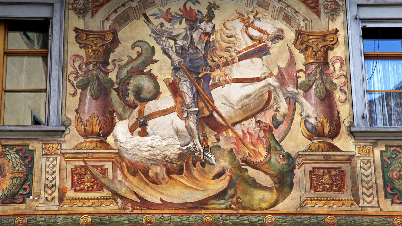 St George and the Dragon fresco on a medieval building in Stein am ...