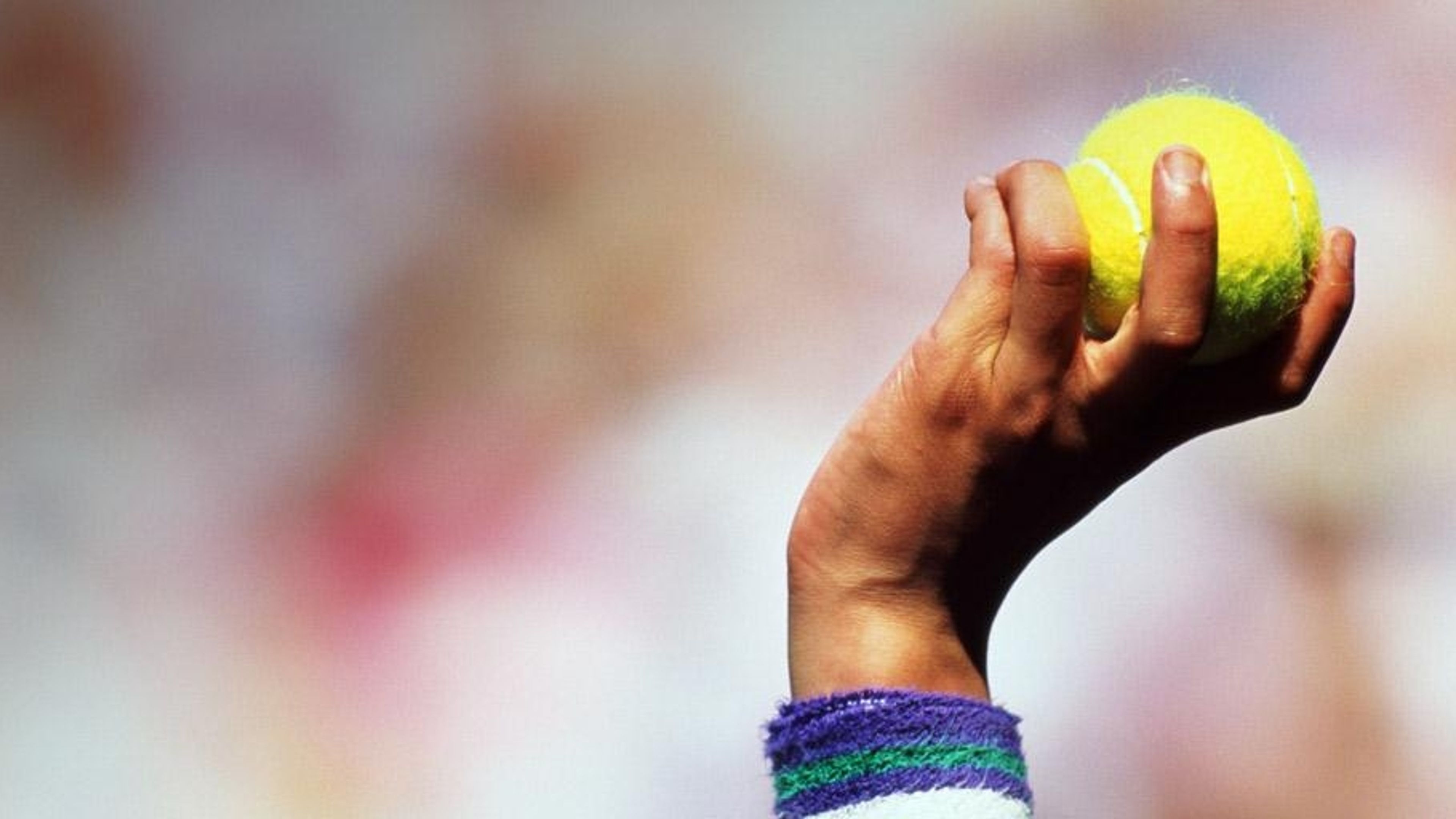 Ballboy's hand holding ball aloft, Wimbledon, England - Bing Gallery