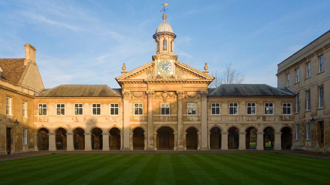 Clock tower of Emmanuel College, University of Cambridge, England ...