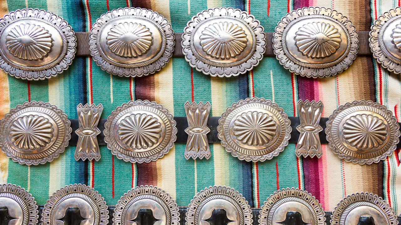 Collection of silver Native American concho belts, Santa Fe, New Mexico ...