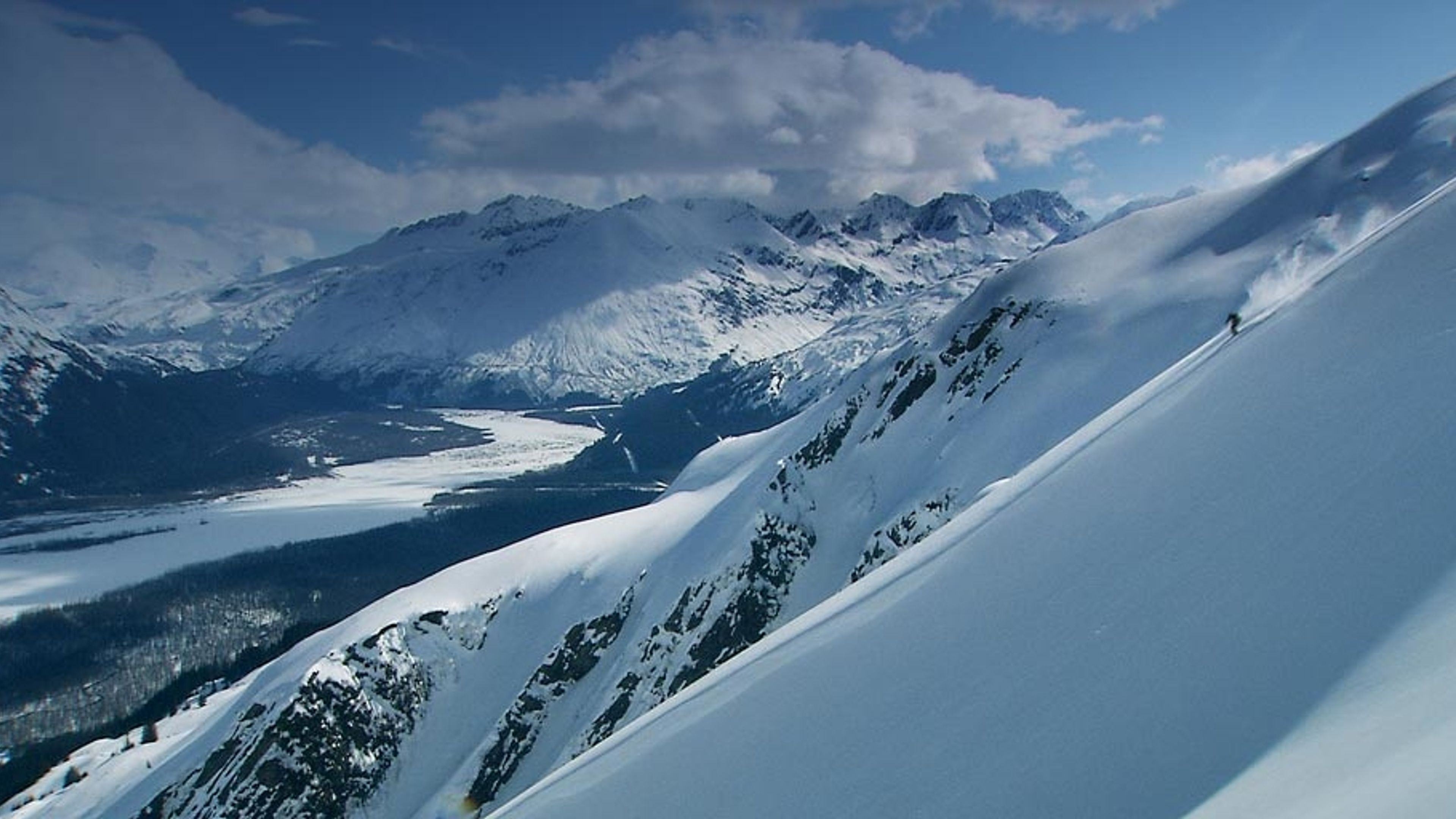 Skier making turns on a ridge near Valdez, Alaska - Bing Gallery