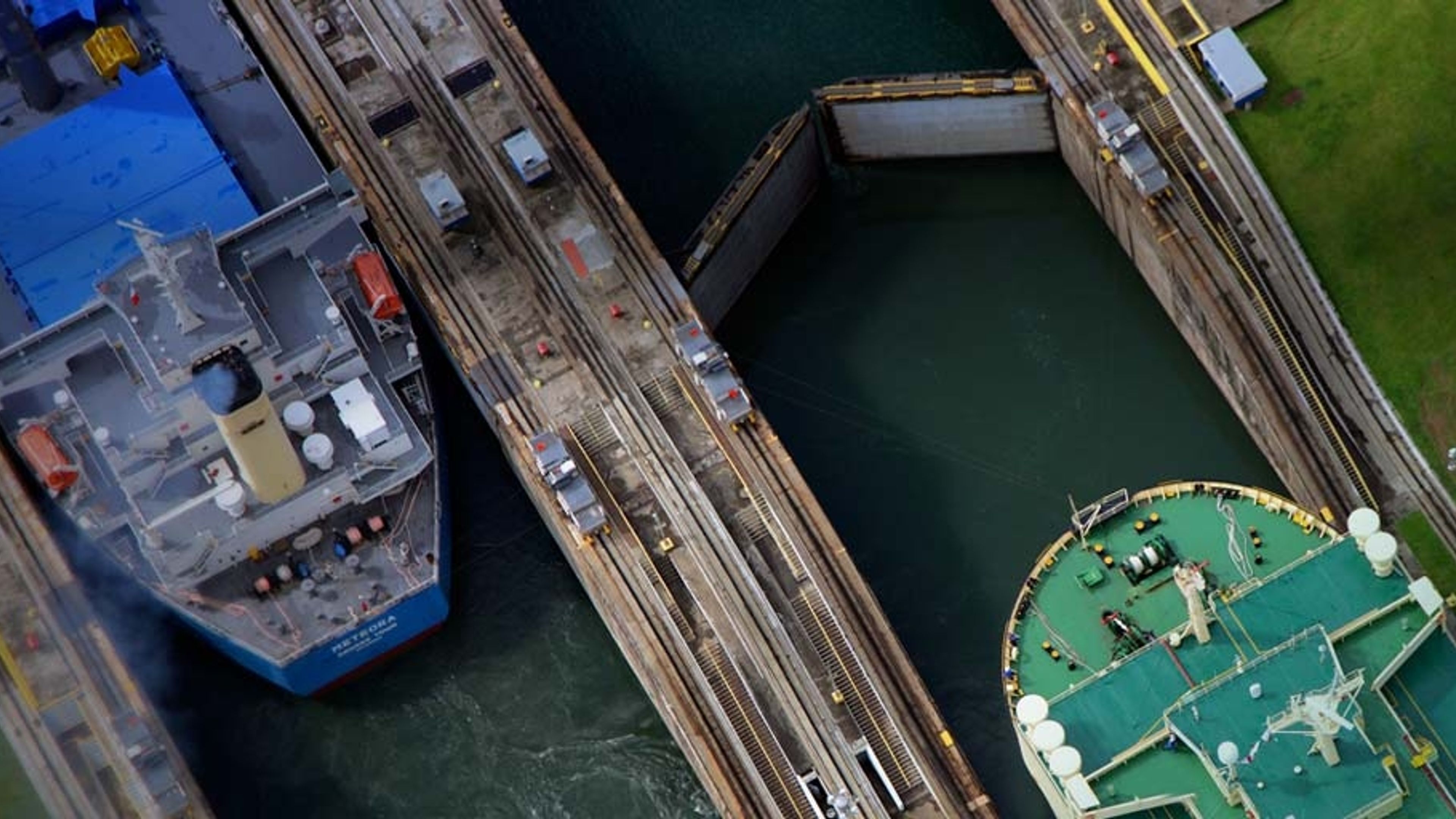 Aerial of two vessels during maneuvers in Gatun Locks, Panama Canal ...