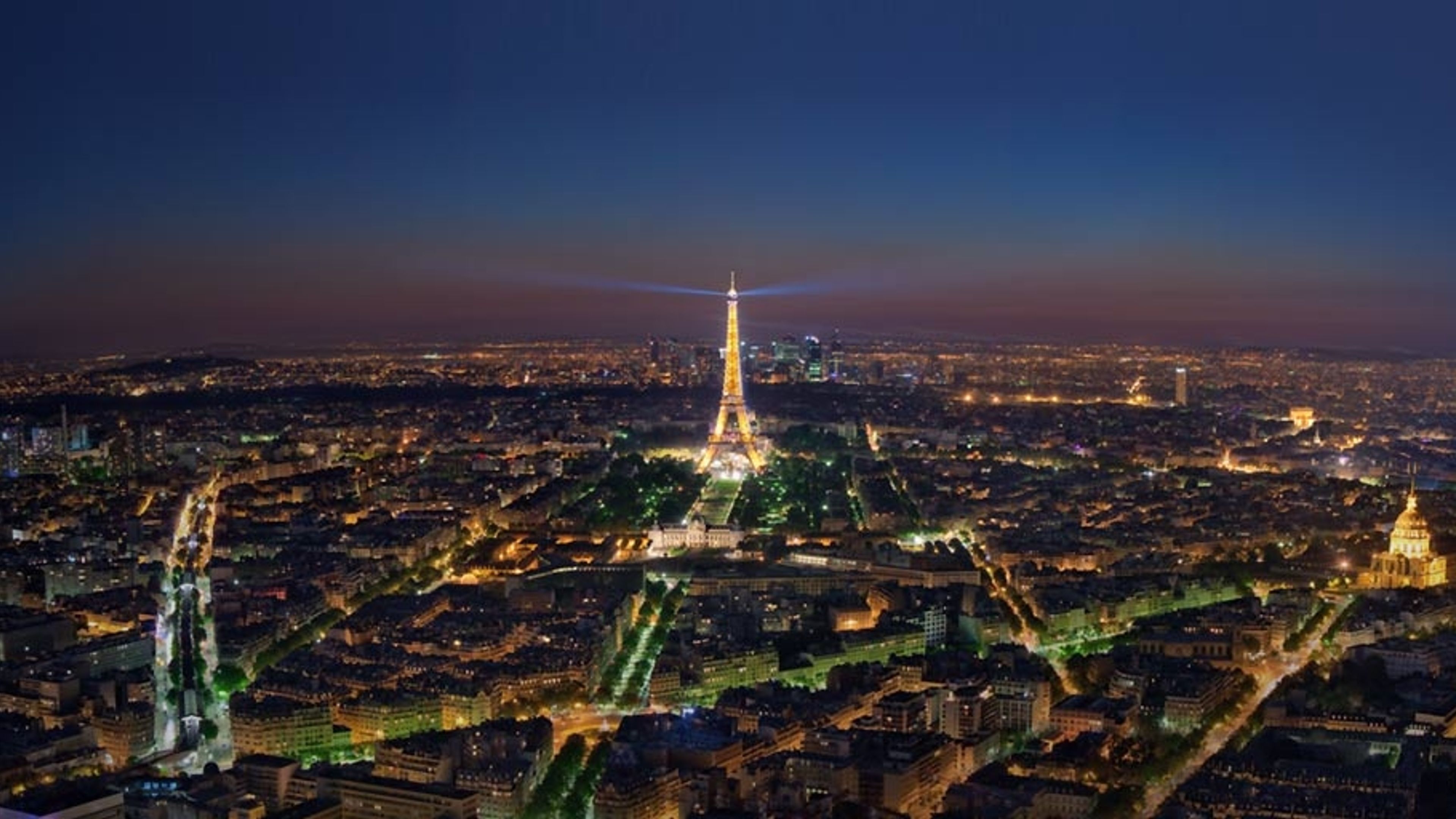 Night falls on Paris, the famously well-lit city, in this mosaic ...